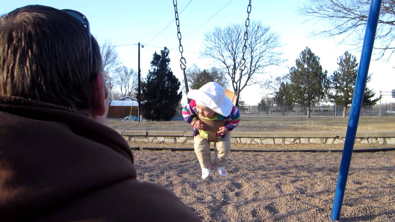 First time on the swings - YouTube