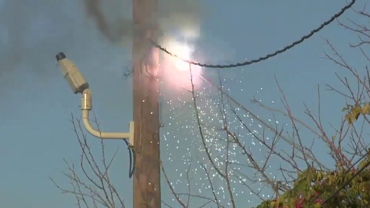Sparking power line adds to danger for crews battling house fire - YouTube