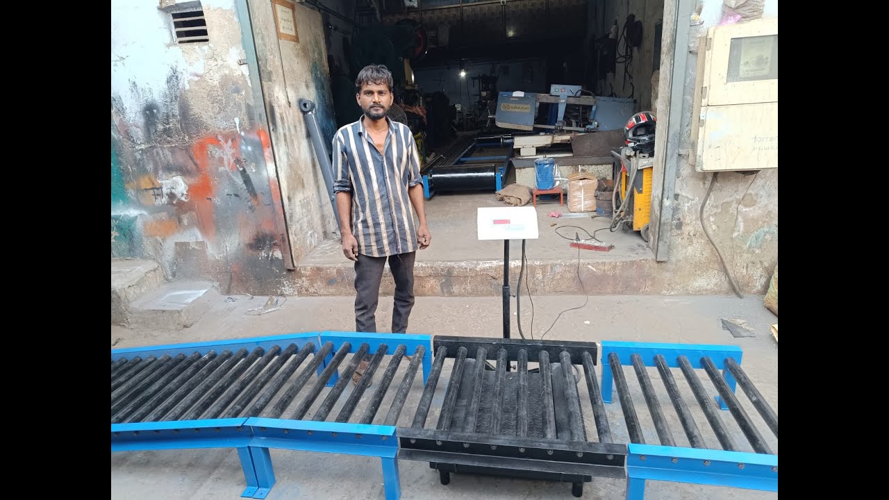 Gravity Roller Conveyor With weighing system - YouTube