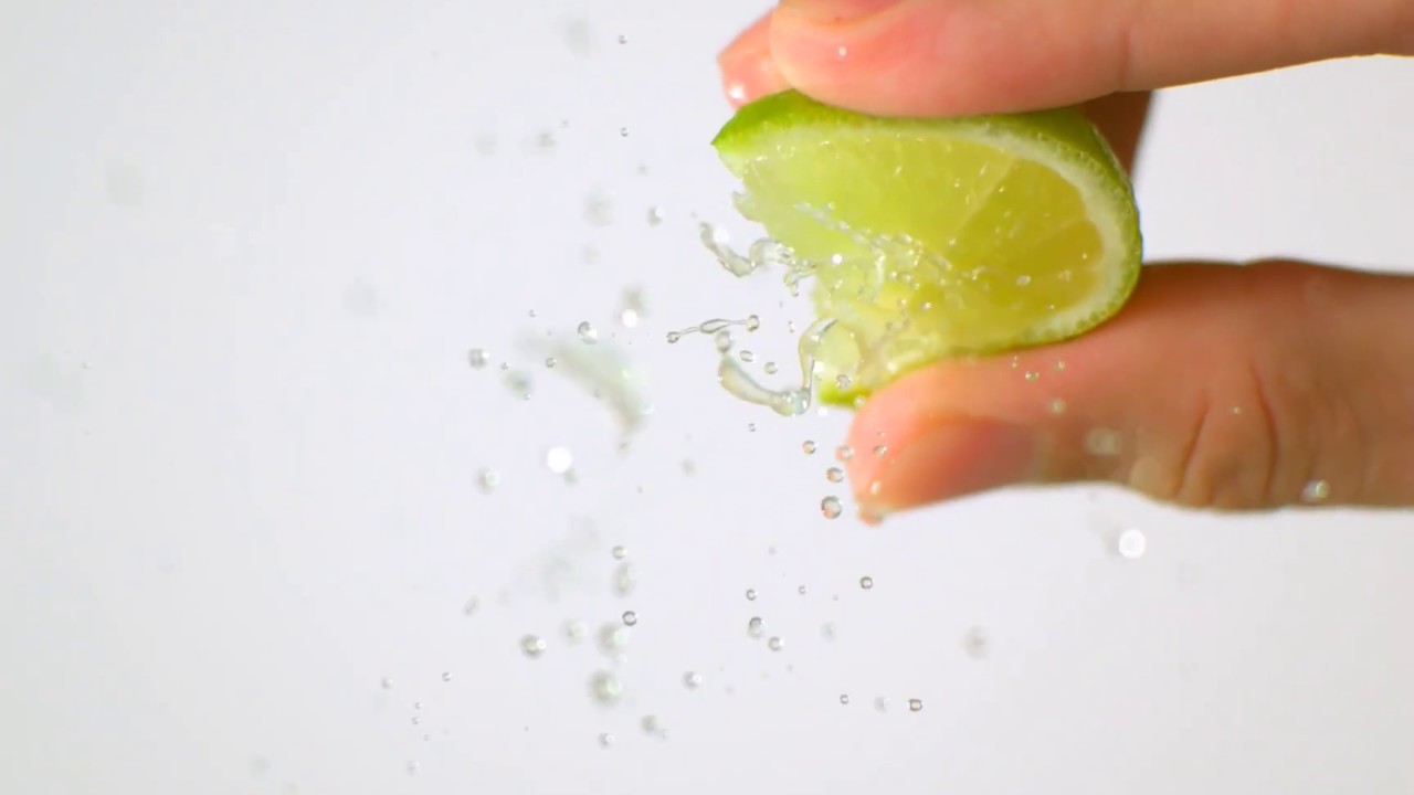 Squeezing Slice of Lime Super Slow Motion - YouTube