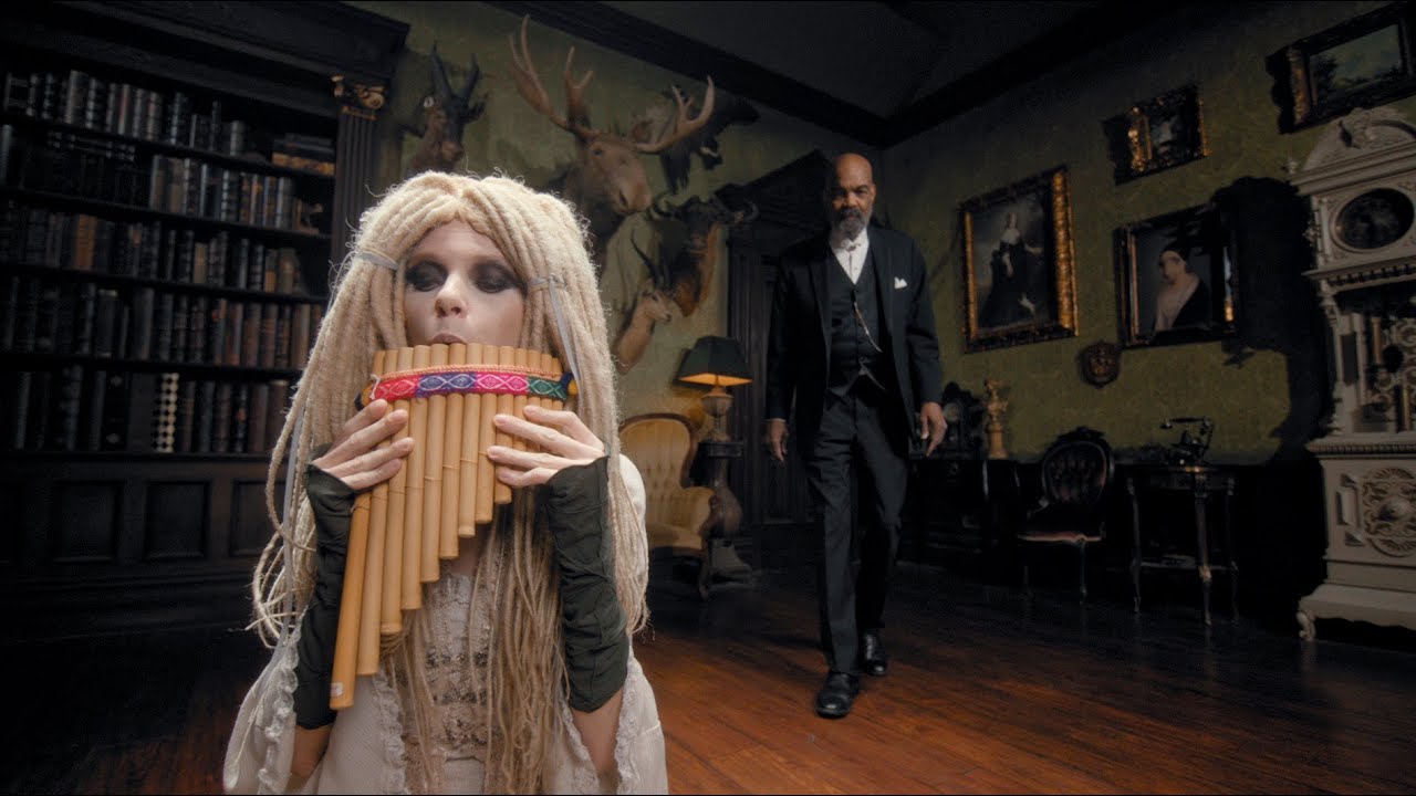 Tangella learns to play the pan flute - YouTube