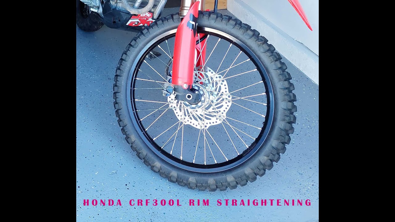 HONDA CRF300L RIM STRAIGHTENING - YouTube
