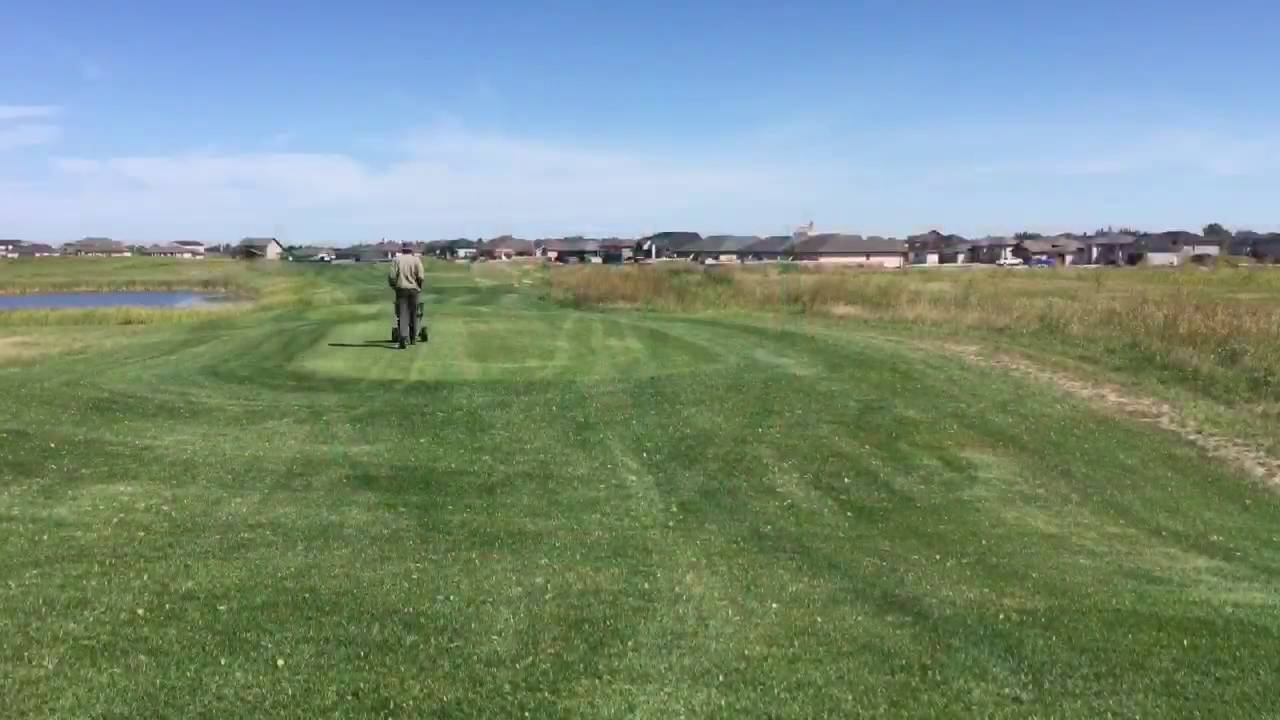 Fertilizing some new tee boxes on #8 and greens. - YouTube