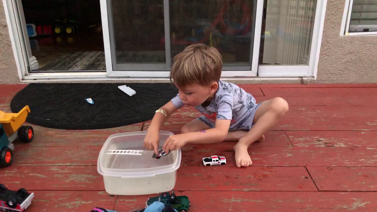 Reed launching toy boats - YouTube