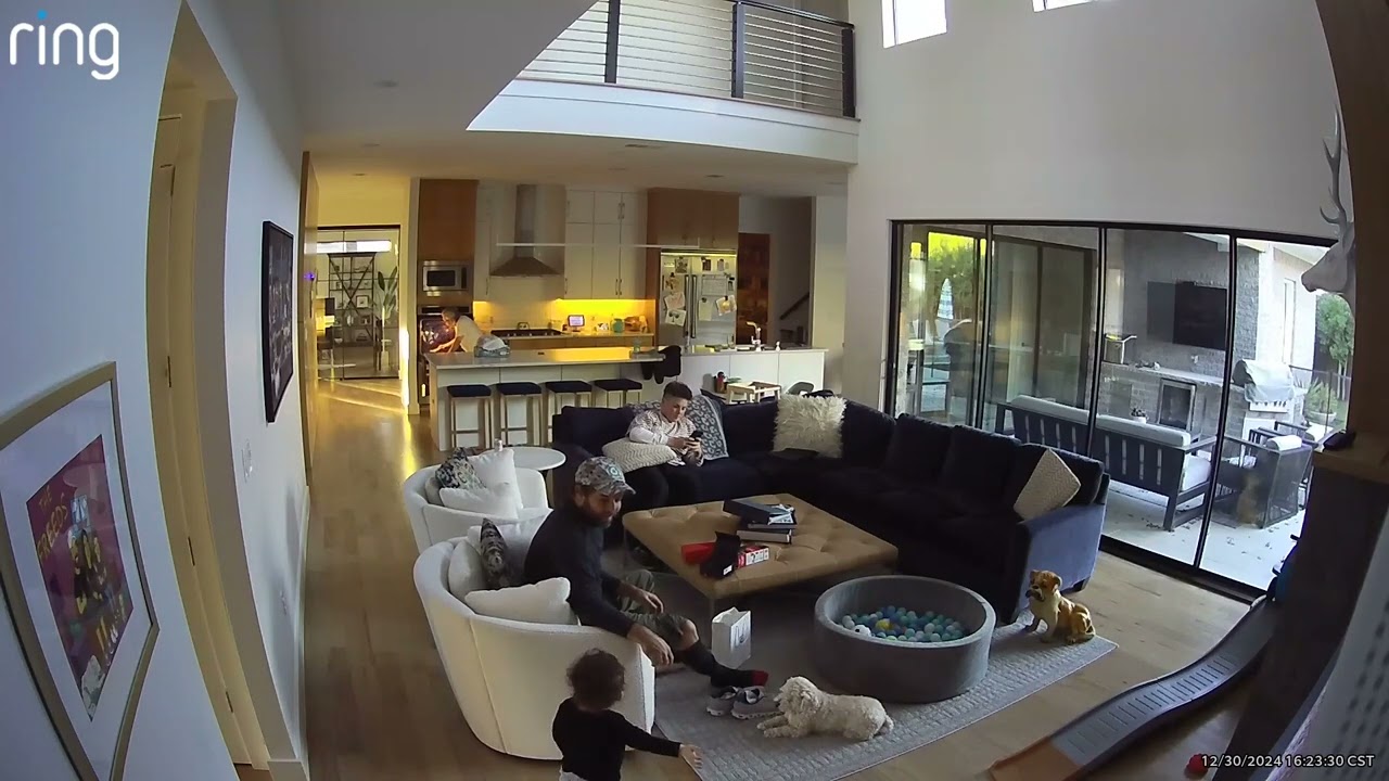 Dad and boy walk from towards kitchen then boy gets bumped and hits ...