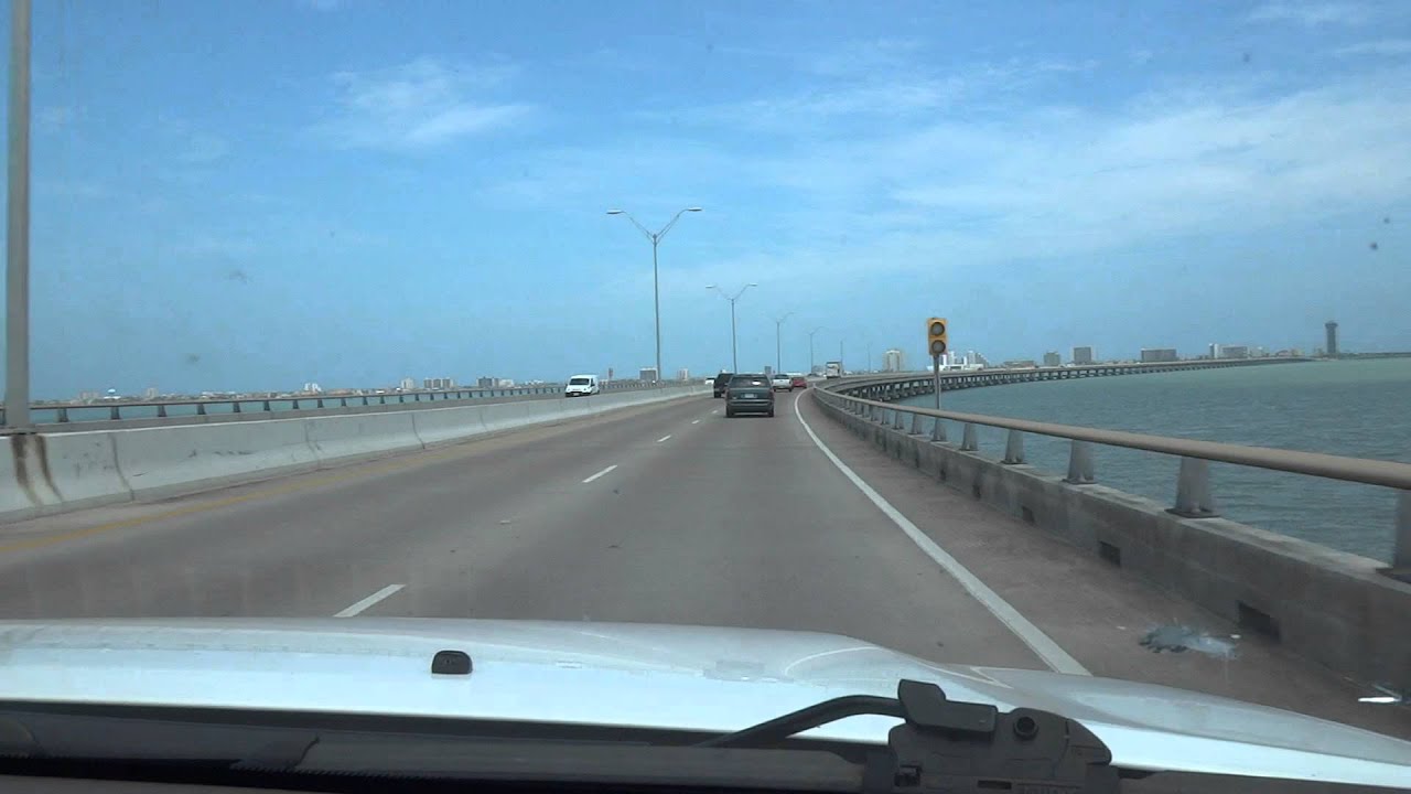 Driving on Isabella Highway 100 from Port Isabel to South Padre Island ...