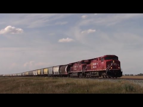 SUPER FAST!!!! CP 8178, CP 8069 and CP 8808 lead CP 302 east at Carseland, Alberta. - YouTube
