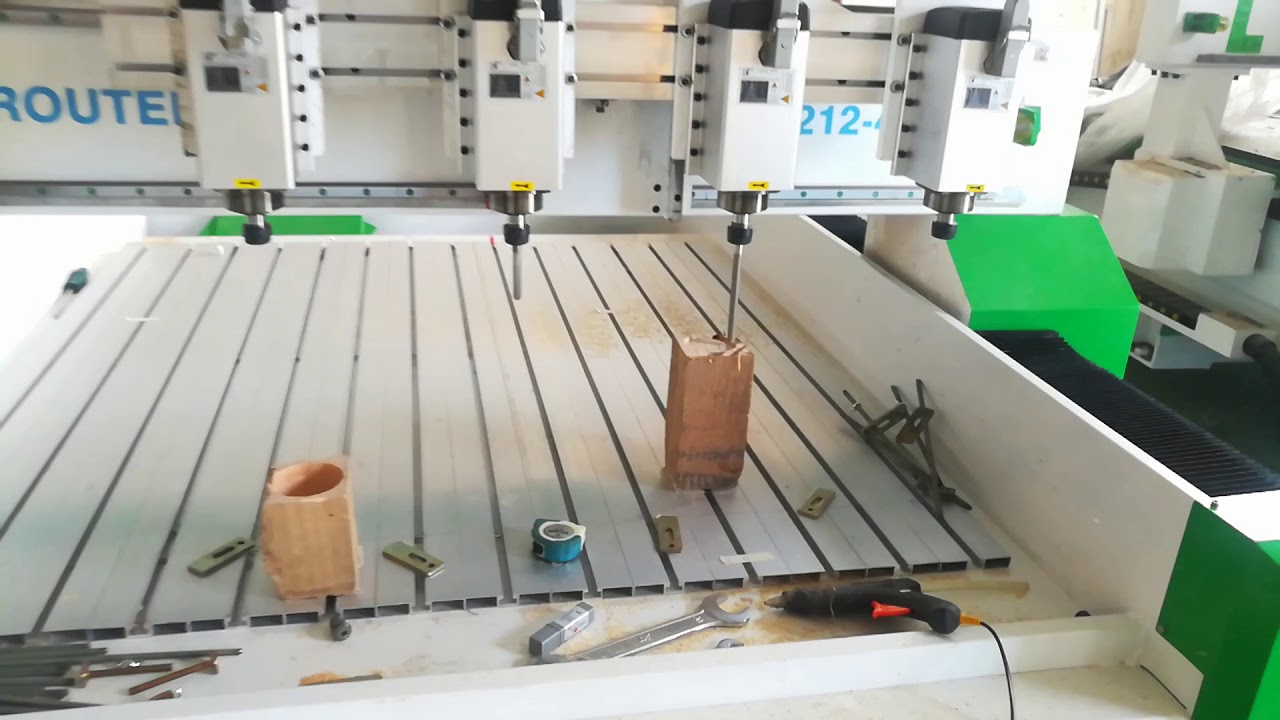 multi-heads CNC wood router engraves true wood in our factory - YouTube