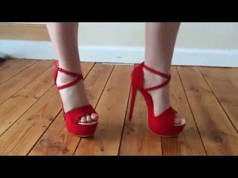 Lucy Lee in red six inch heels