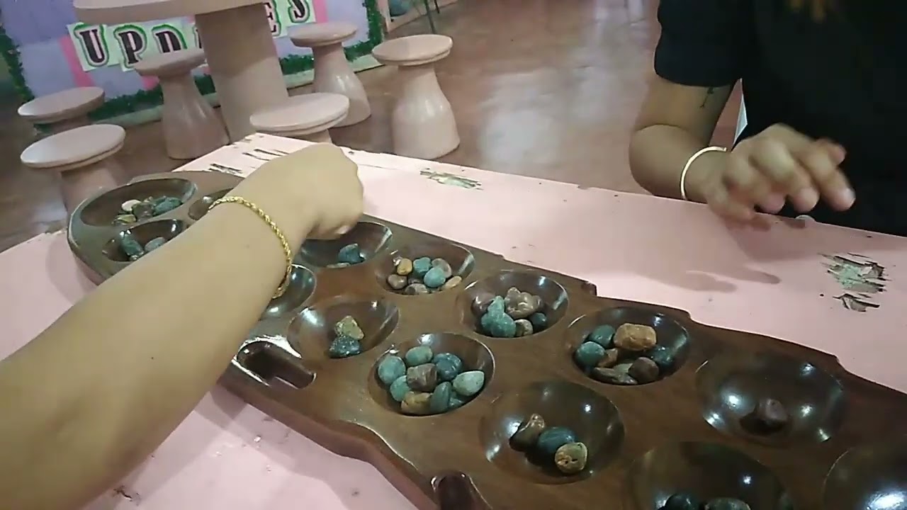 Teaching my Co-Teachers How to Play Sungka - YouTube