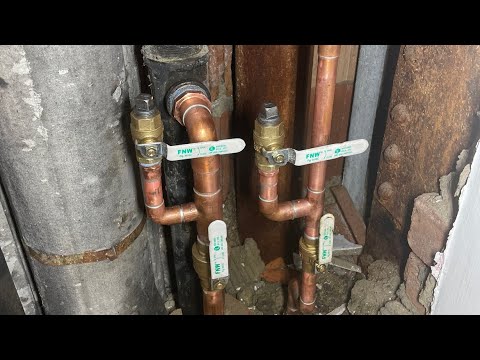 Installing 1 1/4” & 3/4” branch valves for pre war building NYC back to back bathrooms.