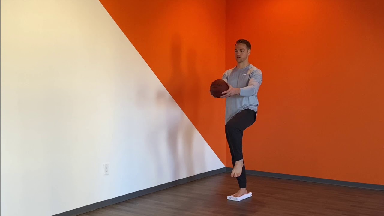 Rolled Towel Single-Leg Balance w/ Medicine Ball Arm Rotation - YouTube