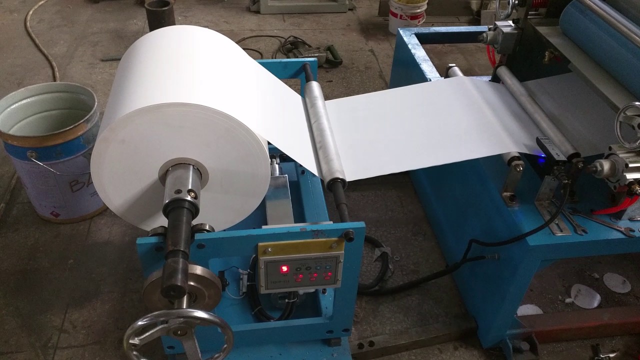 Cigarette paper cutting and rewinding machine - YouTube