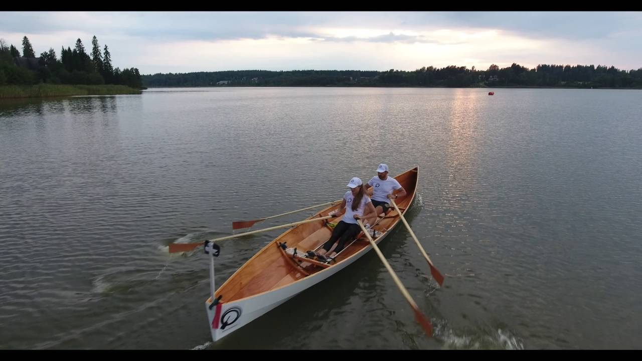 Wooden doubleboat rowing - YouTube