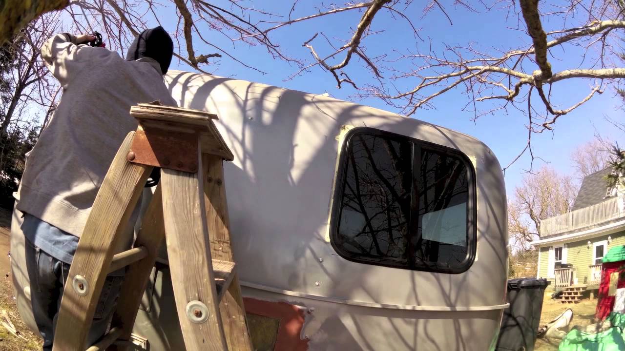 1977 boler Camper - Caulking the new radius windows - YouTube