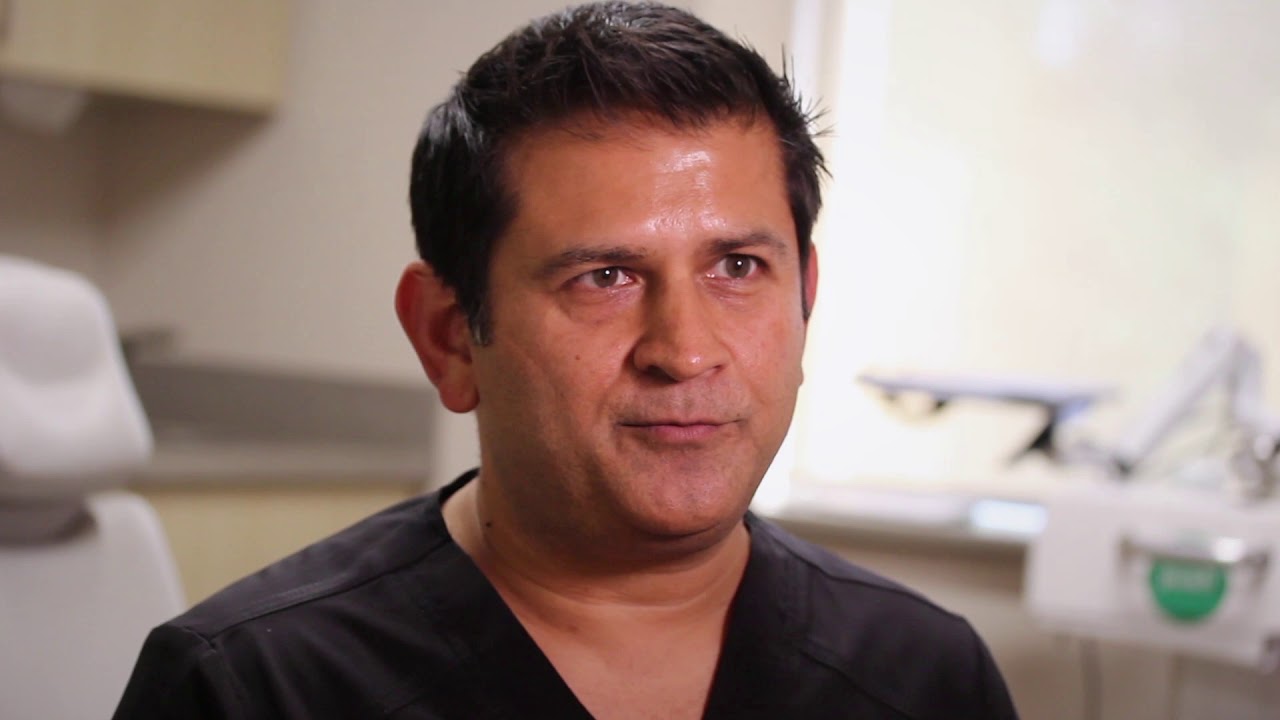 Dr Ryaz Ansari Top Oral Surgeon with YOMI Robot and SurfCT.com - YouTube
