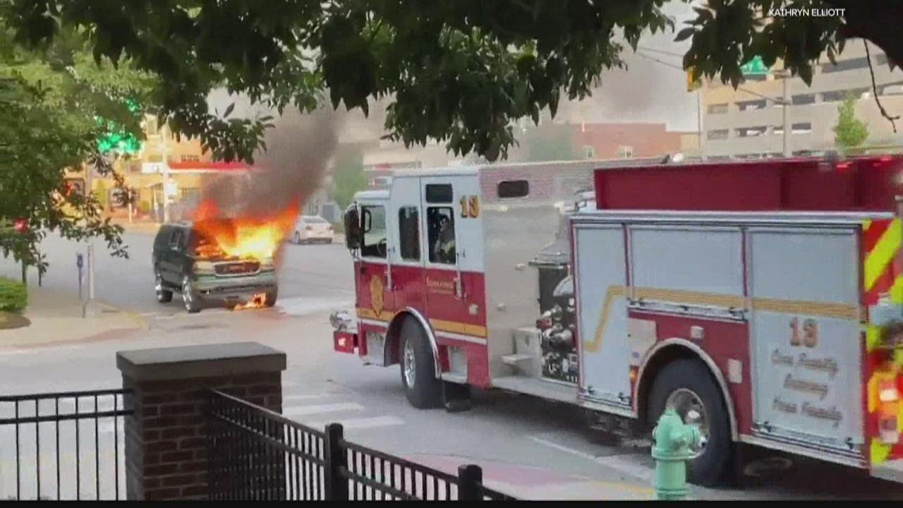Woman helping stranger after downtown car fire - YouTube