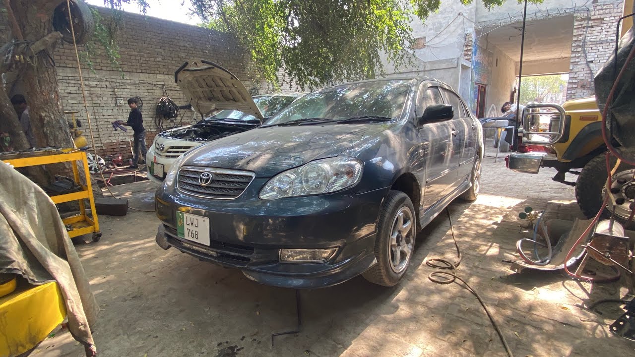 Toyota Corolla Altis front wheel bearing change - YouTube