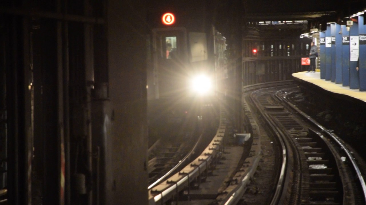 Lexington Av Line: Bronx & Brooklyn bound 4 trains of R142As at 14th St ...