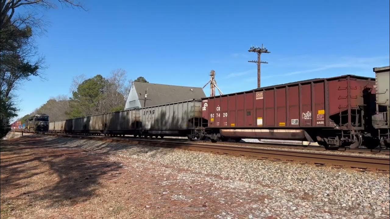 NS coal train passes a waiting intermodal train at Ivor, Virginia - YouTube