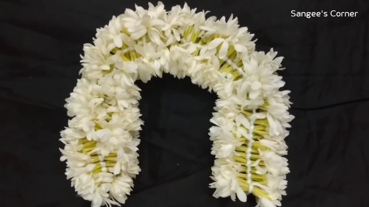 Basic method of tying Mullai flowers in two different ways - YouTube