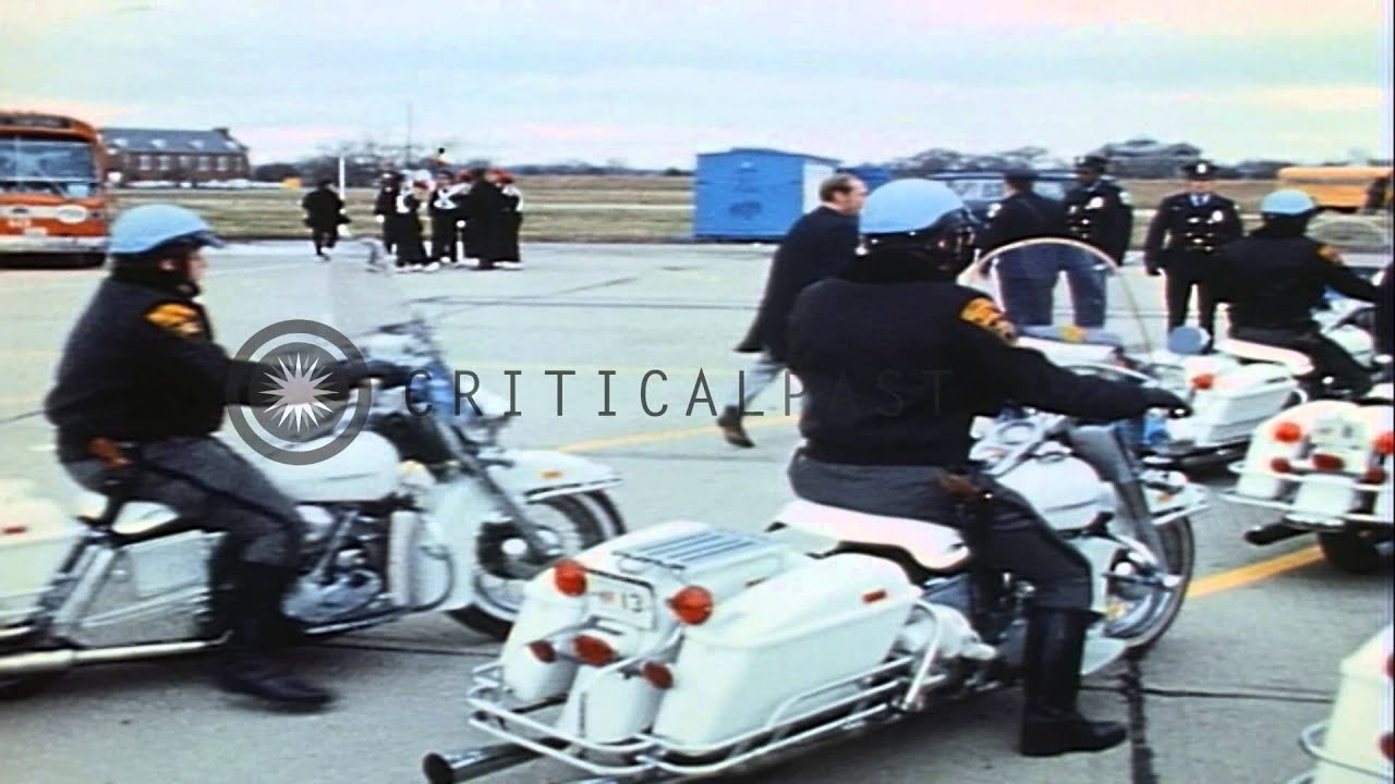 A Police Motorcycle Escort assembles into formation at an airport in ...