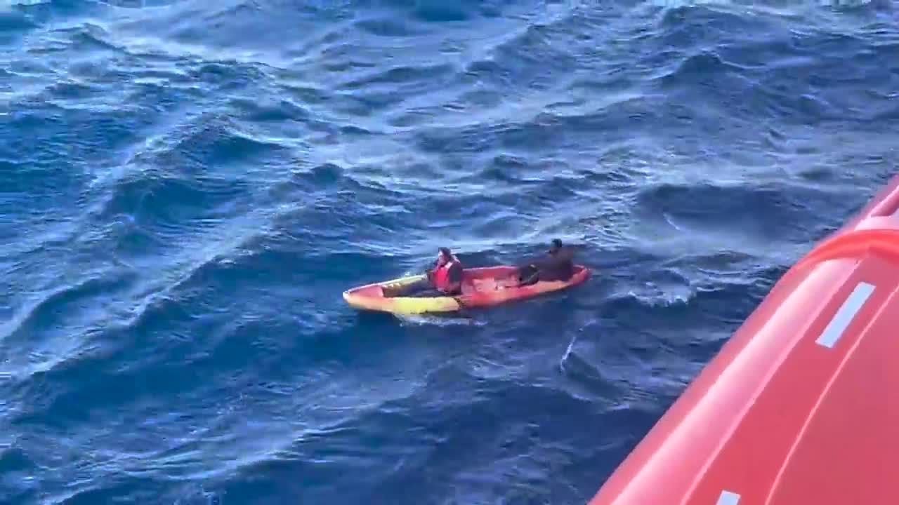 WATCH: 2 men rescued from kayak by cruise ship after their boat sank ...