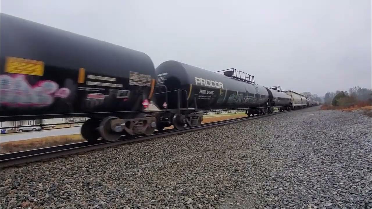 NS 8178 & UP 8170 flying down the grade with the northbound manifest - YouTube