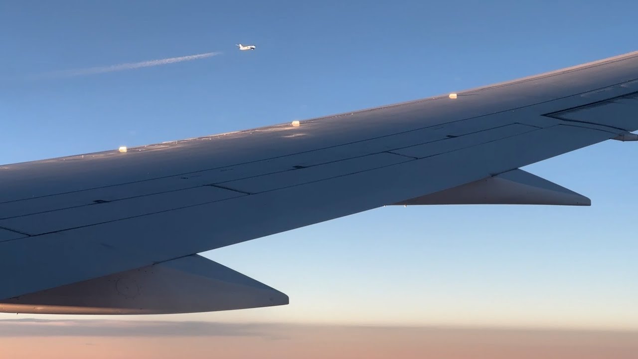 Another plane passing ours at cruising altitude - YouTube