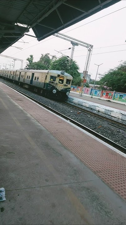 Local train towards Thiruvallur at Korattur railway station - YouTube