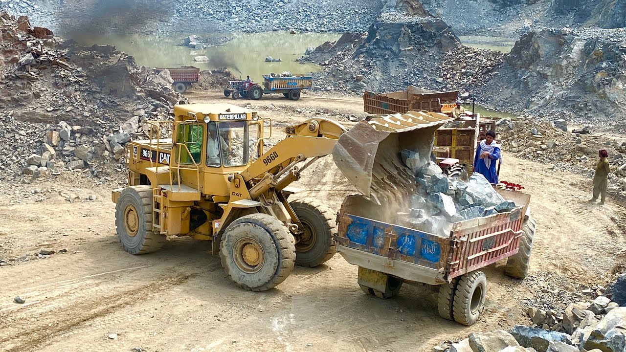 Massive Rocks Loading into Trolleys | Caterpillar Machine in Full Power ...