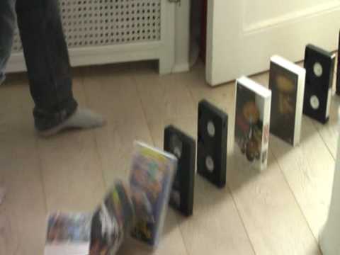 VHS Domino falling VHS tapes - YouTube