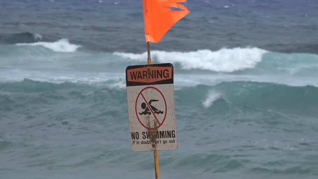 Rescues and rip currents as south shore swell peaks in Hawaii - YouTube