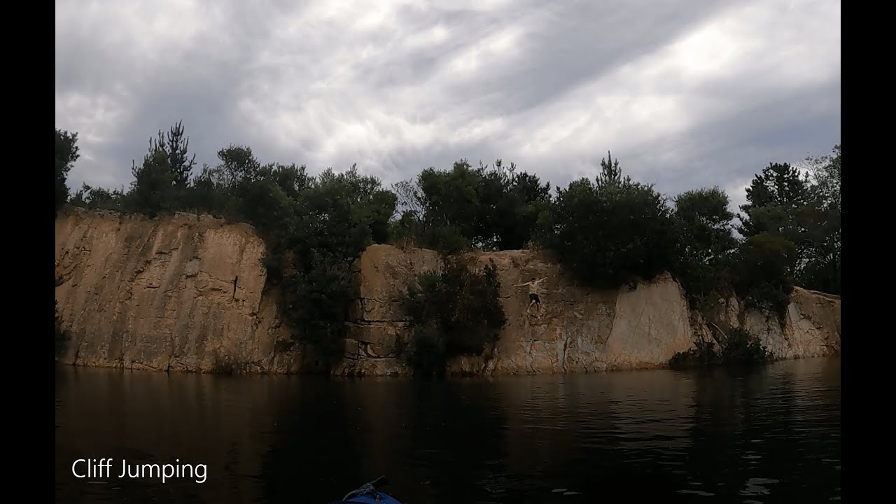 Jumping off rocks at Devils Bend - YouTube