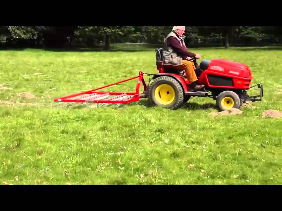 SCH 60" Four Row Scarifying Rake on 3 Point Linkage (on grass) - YouTube