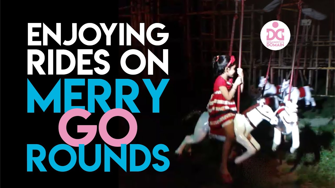Enjoying Rides On Merry Go Rounds Enjoying Fast Moving Merry Go