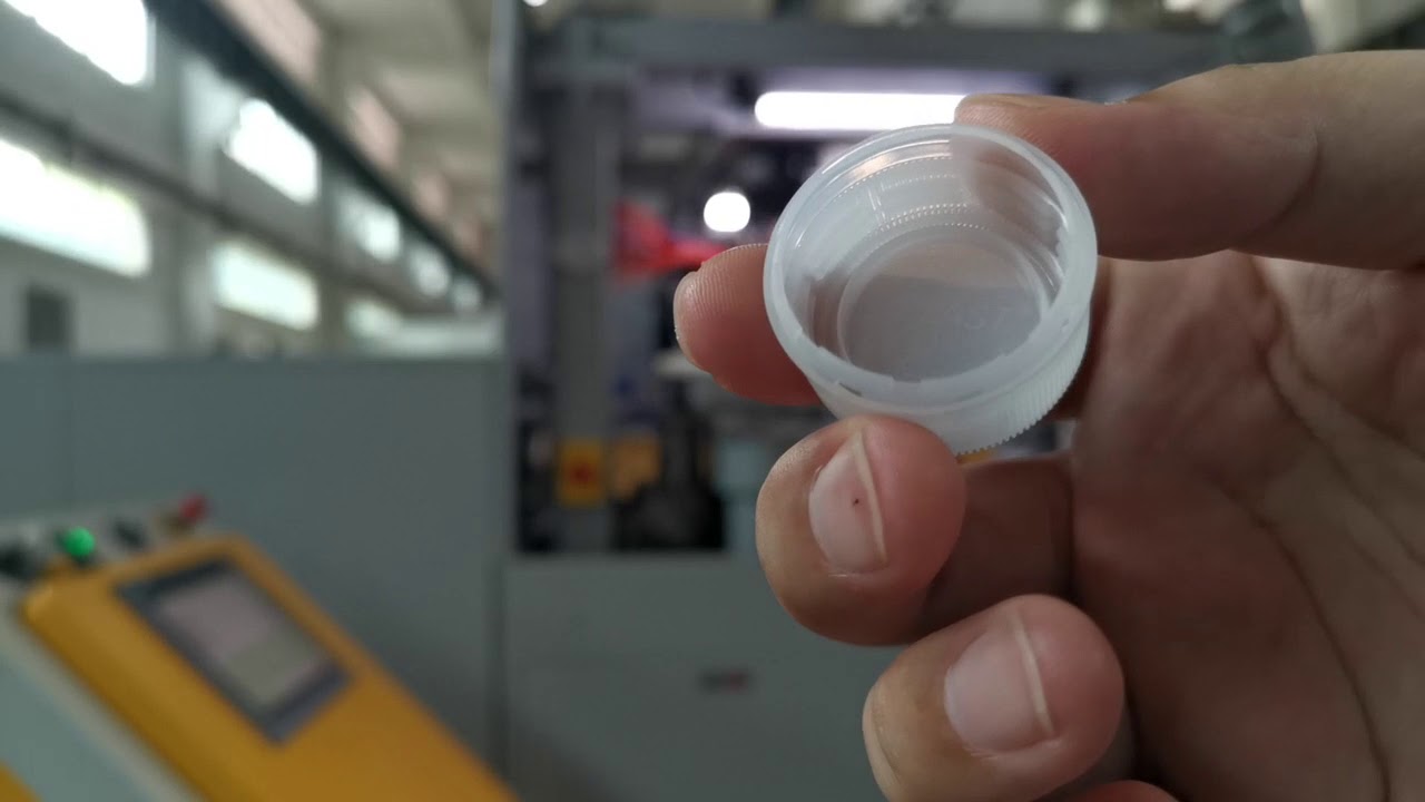 24 cavity CCM machine PCO1881 CSD cap 25000pcs/h - YouTube