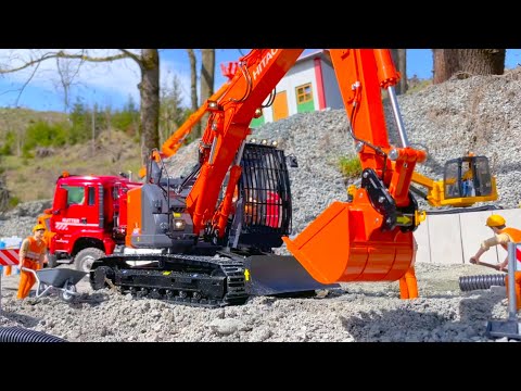 RC TRUCK MAN AND HITACHI 135 DIGGER WORKING HARD IN THE QUARRY - FUMOTEC KOMATSU PC 290 TILTROTATOR