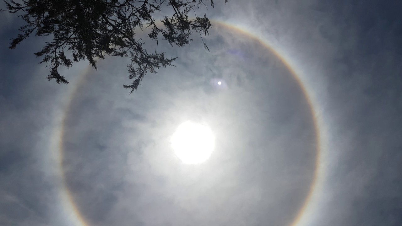 Efecto del sol con aureola al mediodia en Santa Fe - YouTube