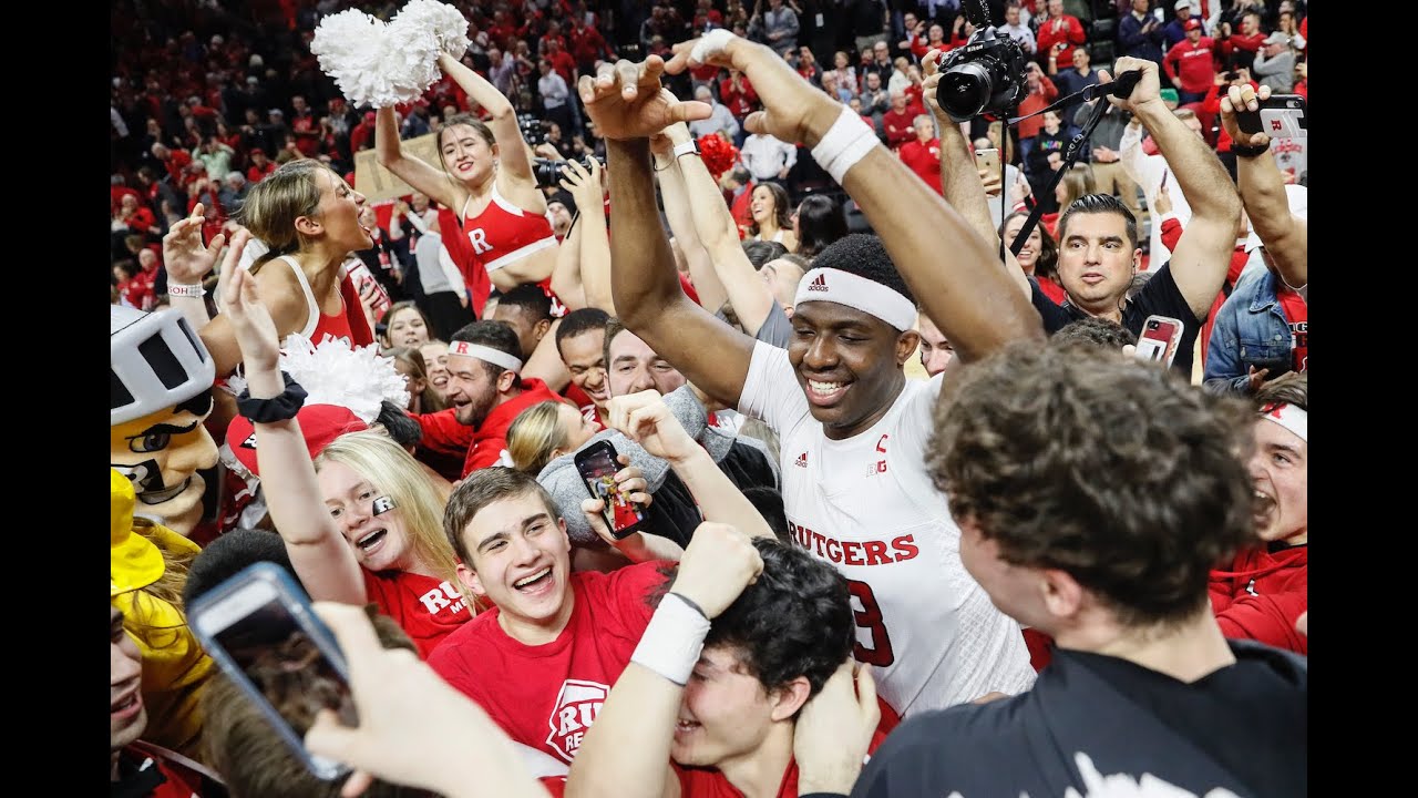 Rutgers fans storm court after beating No. 9 Maryland - YouTube