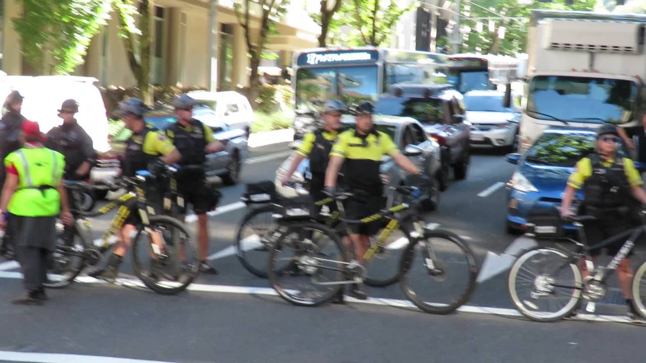 cop gets hit in head with rock - YouTube