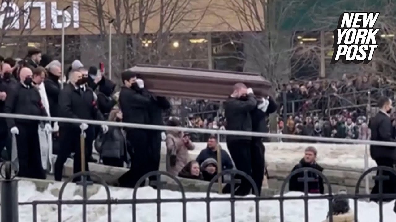 Alexei Navalnys Body Seen In Coffin As Thousands Defy Putin To Honor