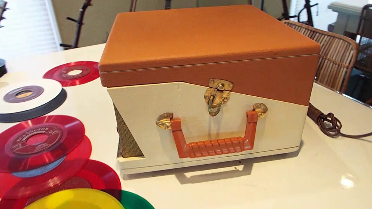 Capitol record player 45 RPM playing a stack of 45's - YouTube