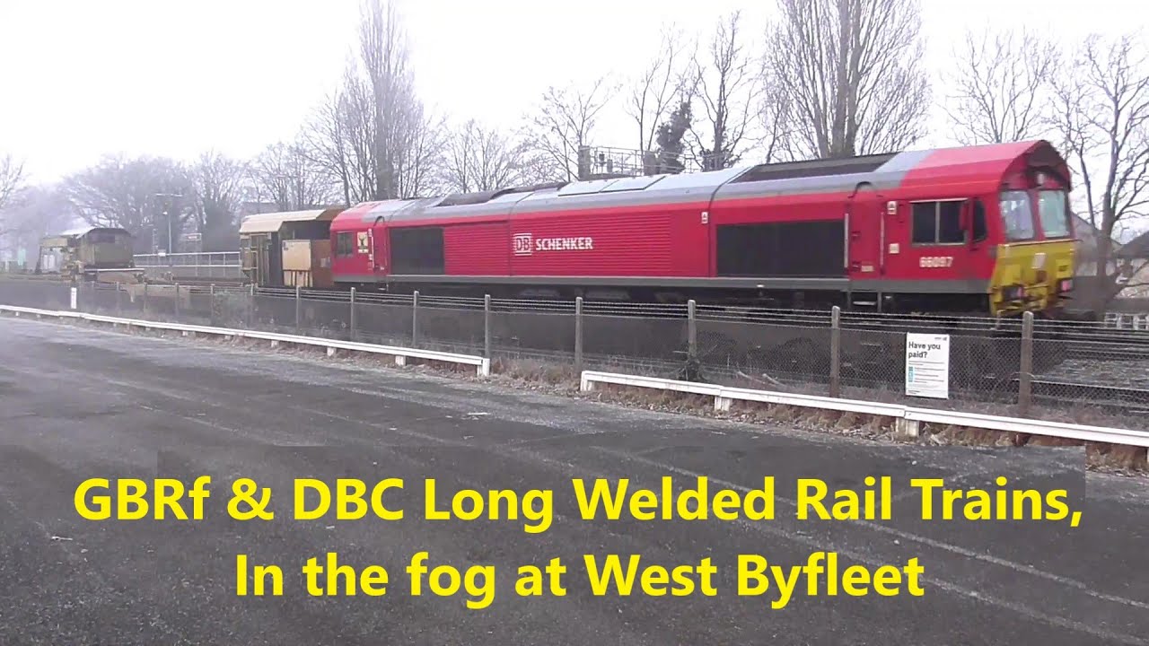 GBRf & DBC Long welded rail trains emerging from the fog at West ...