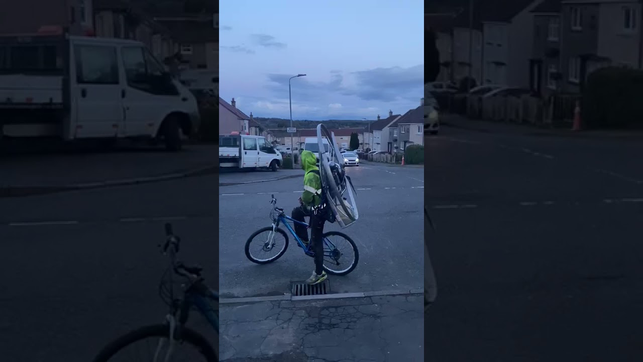 Man uses giant fan type propeller on bike - YouTube