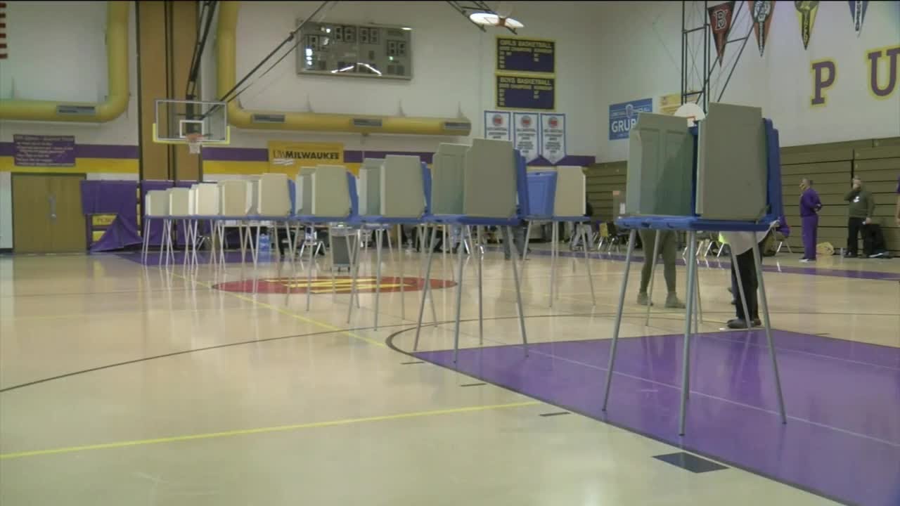 Voting at Washington High School - YouTube