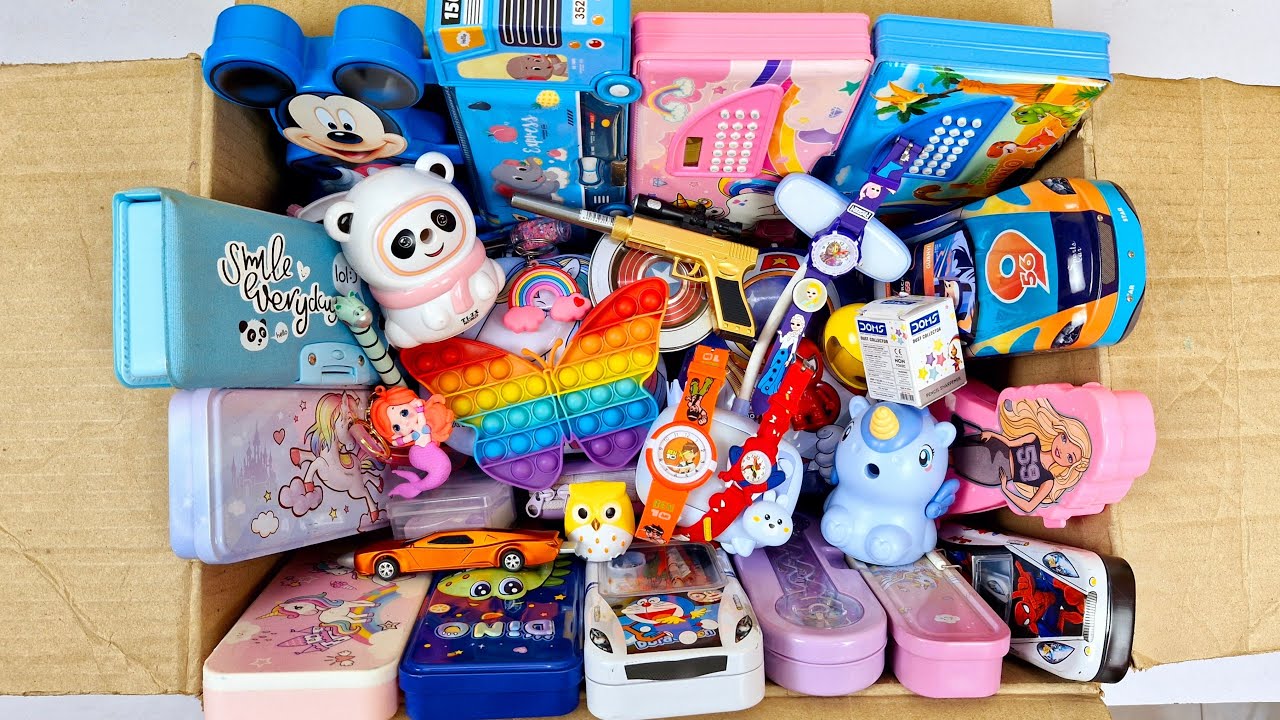 Box full of cute fancy stationery items - piggy bank, pencil case ...