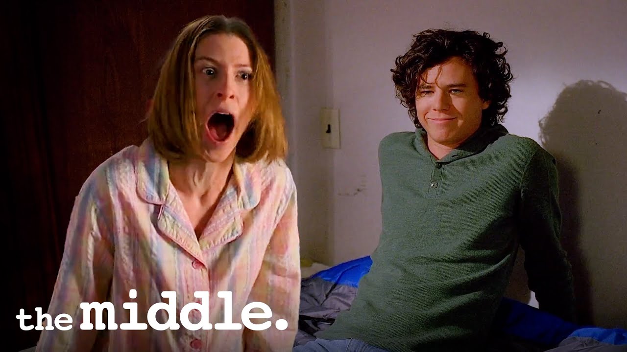 Axl Moves in with Sue | The Middle - YouTube