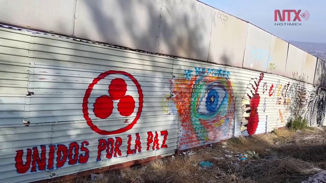 Artista Enrique Chiu transforma muro fronterizo en mural de arte en ...