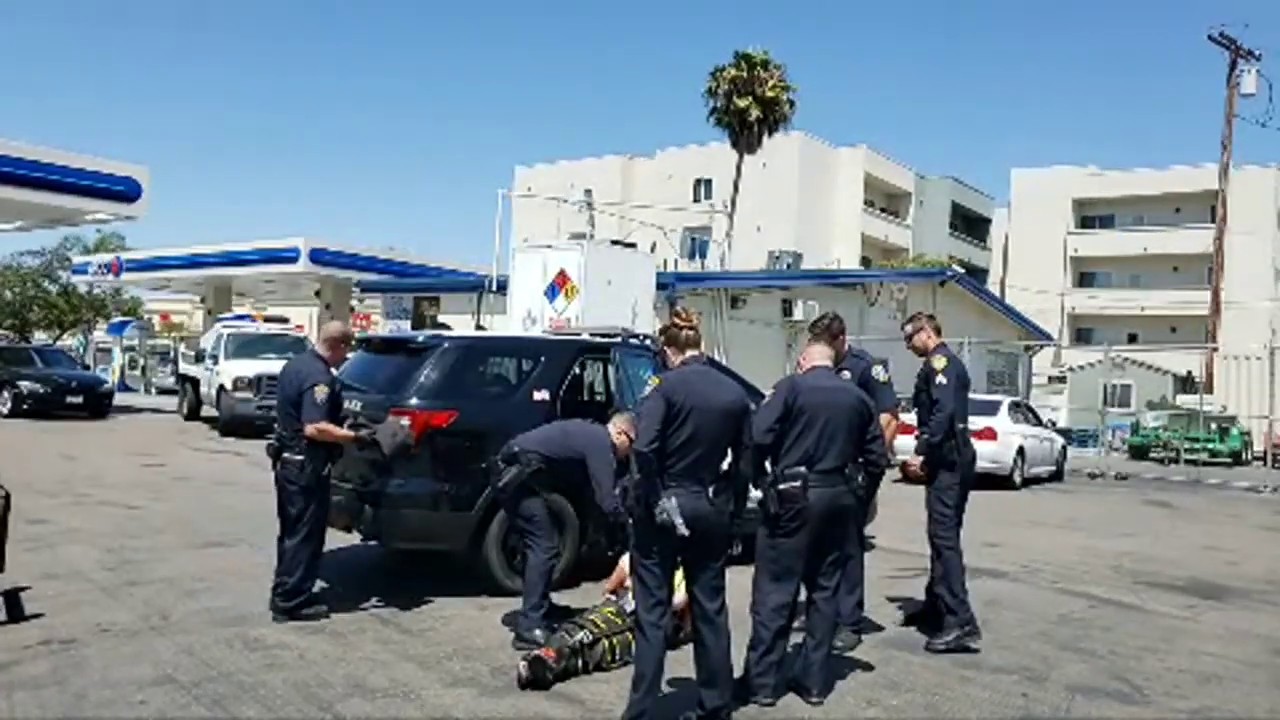 Live Copwatch | Woman Put in Body Wrap & Spit Sock - YouTube